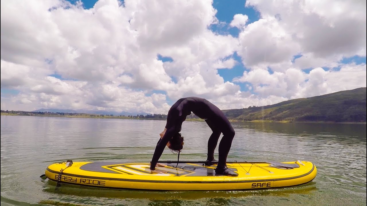 PADDLE BOARDING YOGA (attempt) in the Sacred Valley! - YouTube