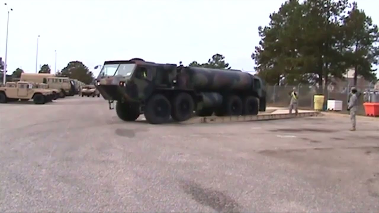 BCI HEMTT Refueler Parking in a Rigid Containment System 1 - YouTube