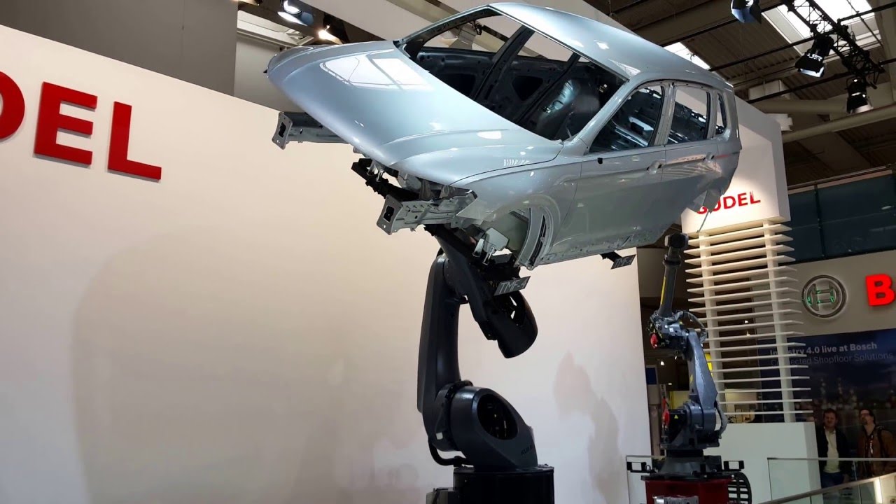 Huge + Strong Industrial Robot Handling A Car - YouTube
