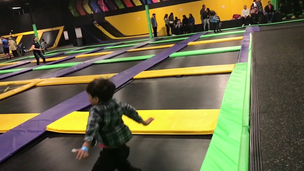 Slow motion kid jump at trampoline park - YouTube