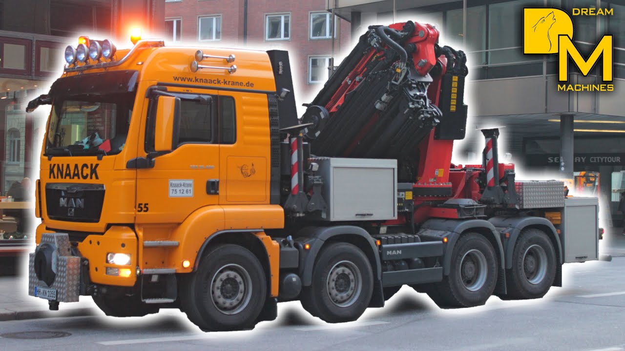 Powerful Palfinger PK110002 crane MAN truck chassis lifting steel beams ...