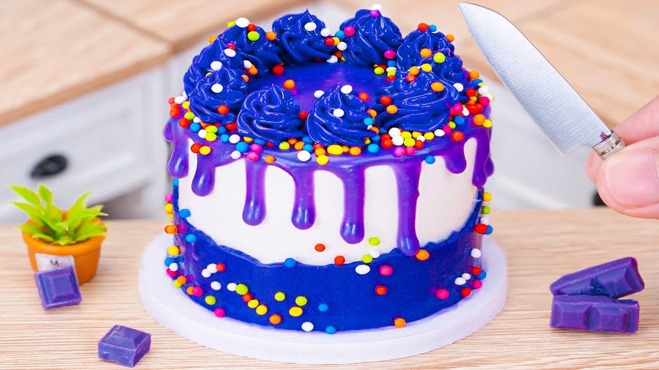 Ymmy purple chocolate cake decorating with sprinkles candy for a fun ...