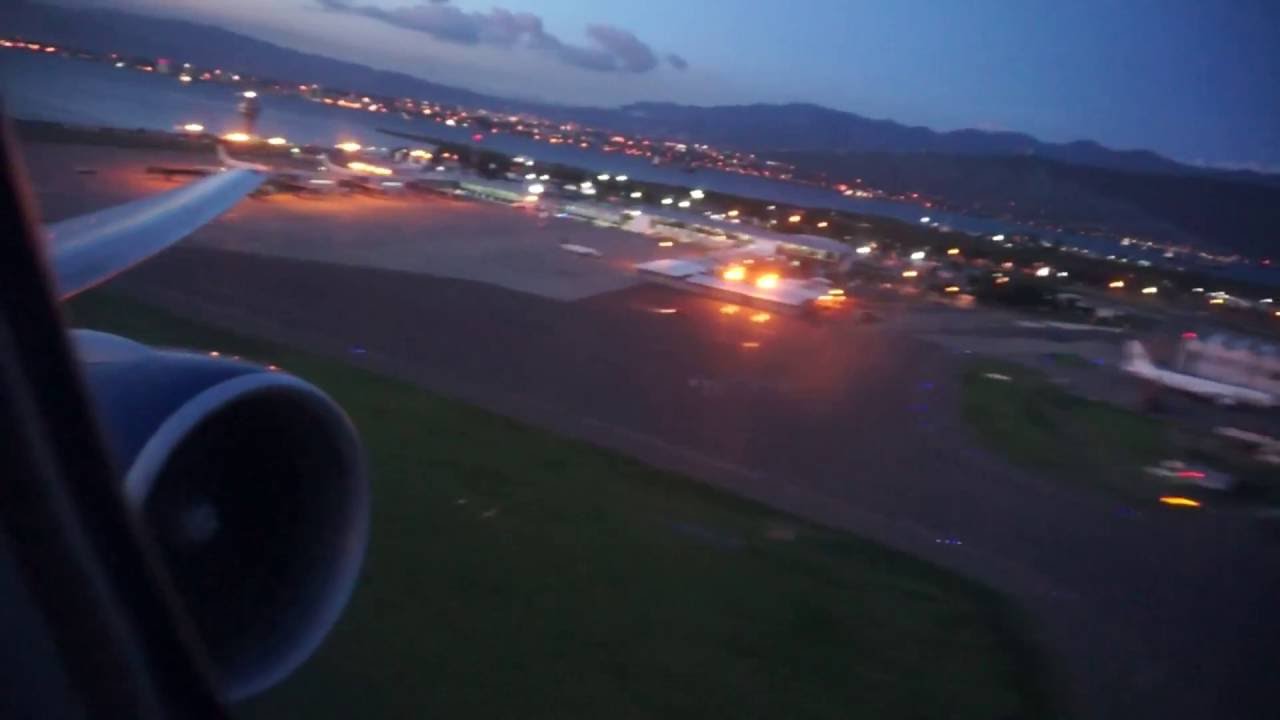 British Airways 777 - flight 2262 - dusk takeoff from Kingston Jamaica ...