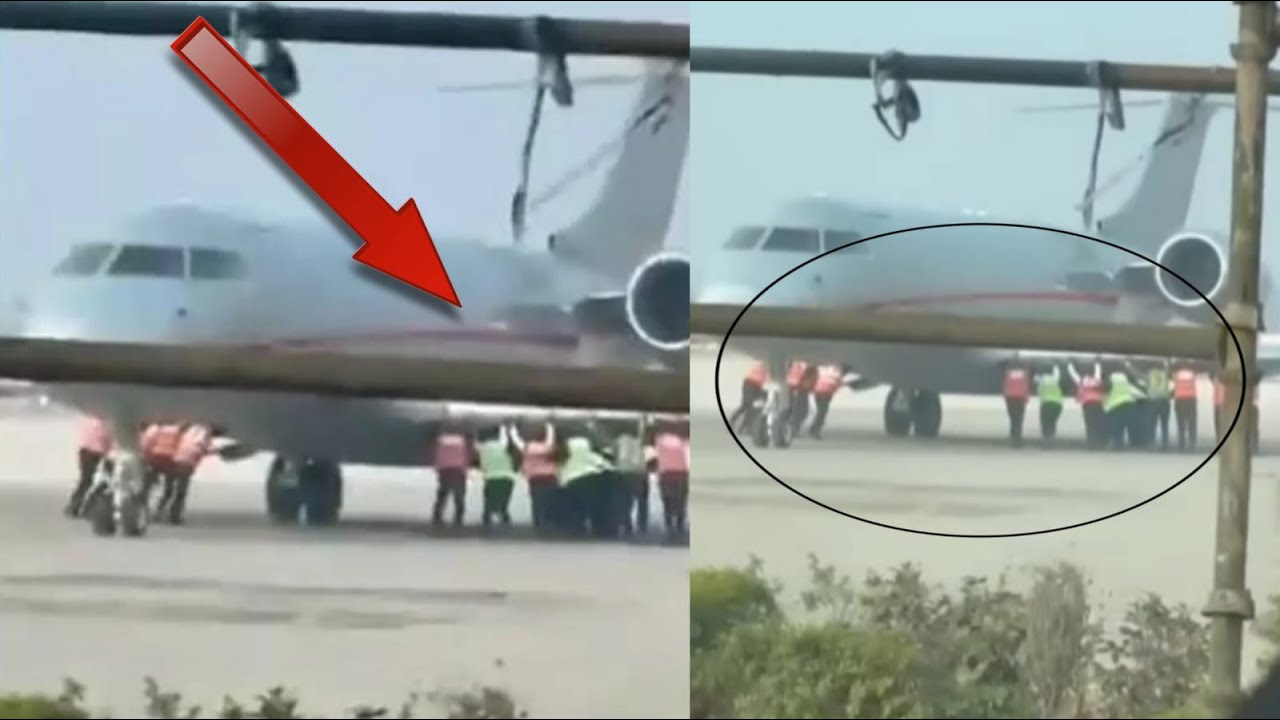 Video of Crew Pushing Plane Goes Viral - YouTube