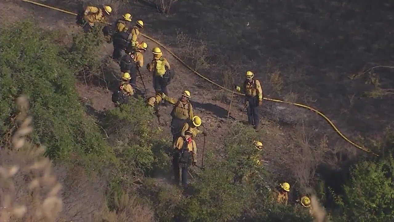 Crews respond to large fire in South Bay - YouTube