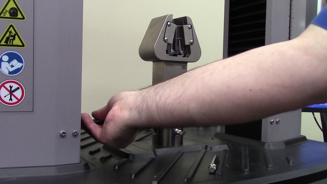 mechanical wedge grips--part 4--installation onto testing machine - YouTube