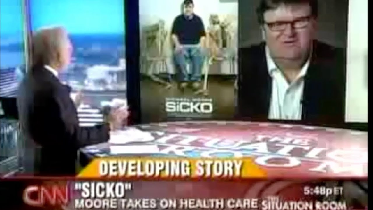 Opie & Anthony: Michael Moore vs. Wolf Blitzer (Video) - YouTube