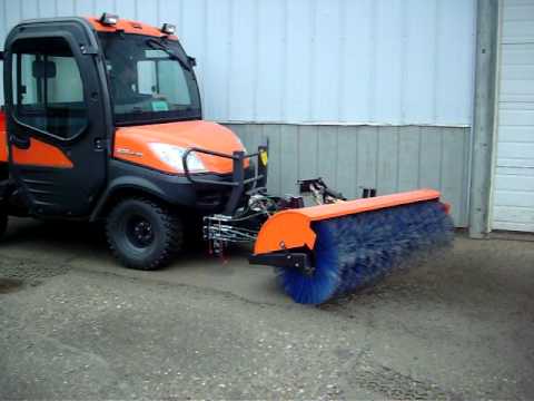 RTV1100 with kanlan sweeper 4 - YouTube