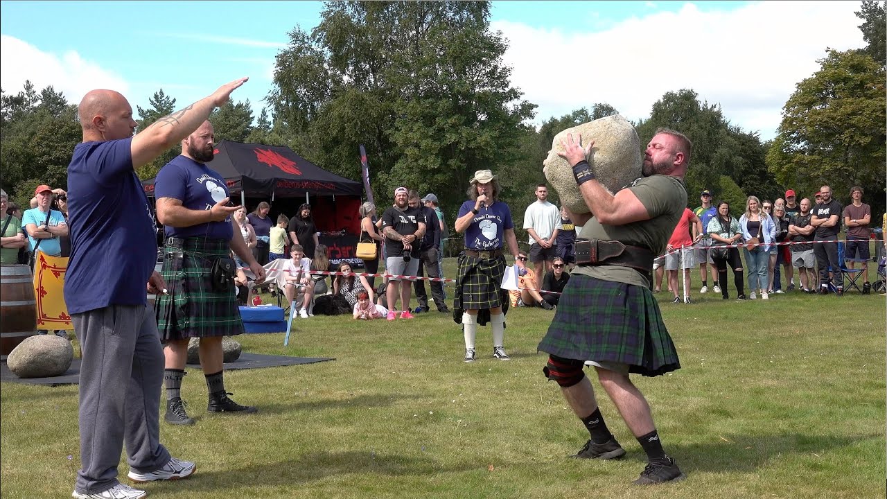 Strongman Magoo stone lift challenge during The Gathering VI Donald ...