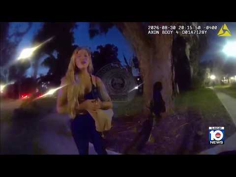 Video shows police officers arrest 24-year-old woman after crash