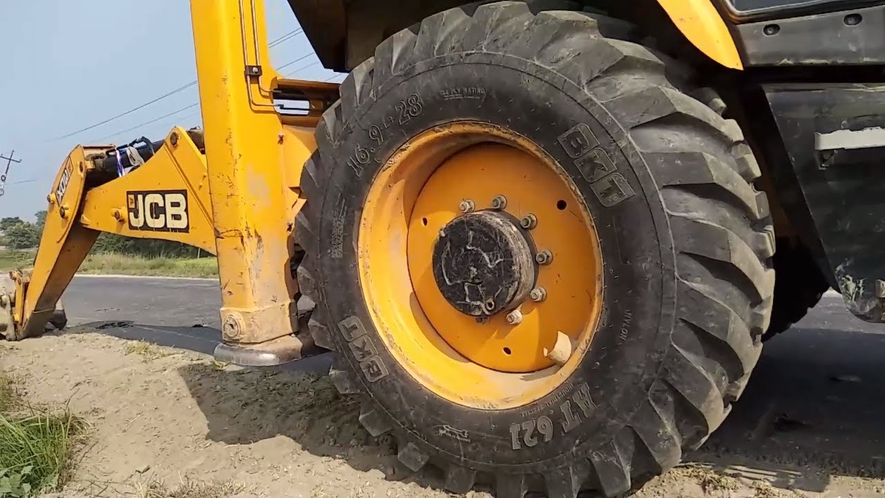 JCB 3DX Backhoe Digging on Roadside - JCB Digger Busy Digging and ...