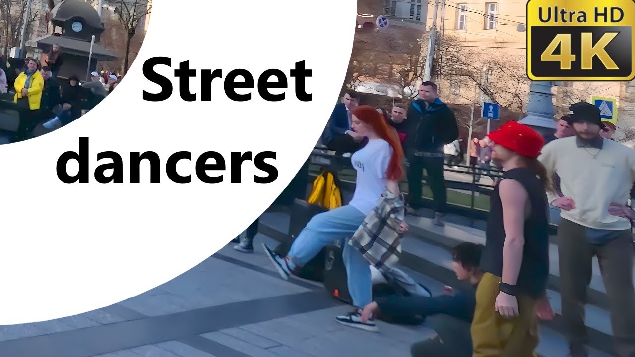 Street dancers entertain people in the city's central square. Video4K ...