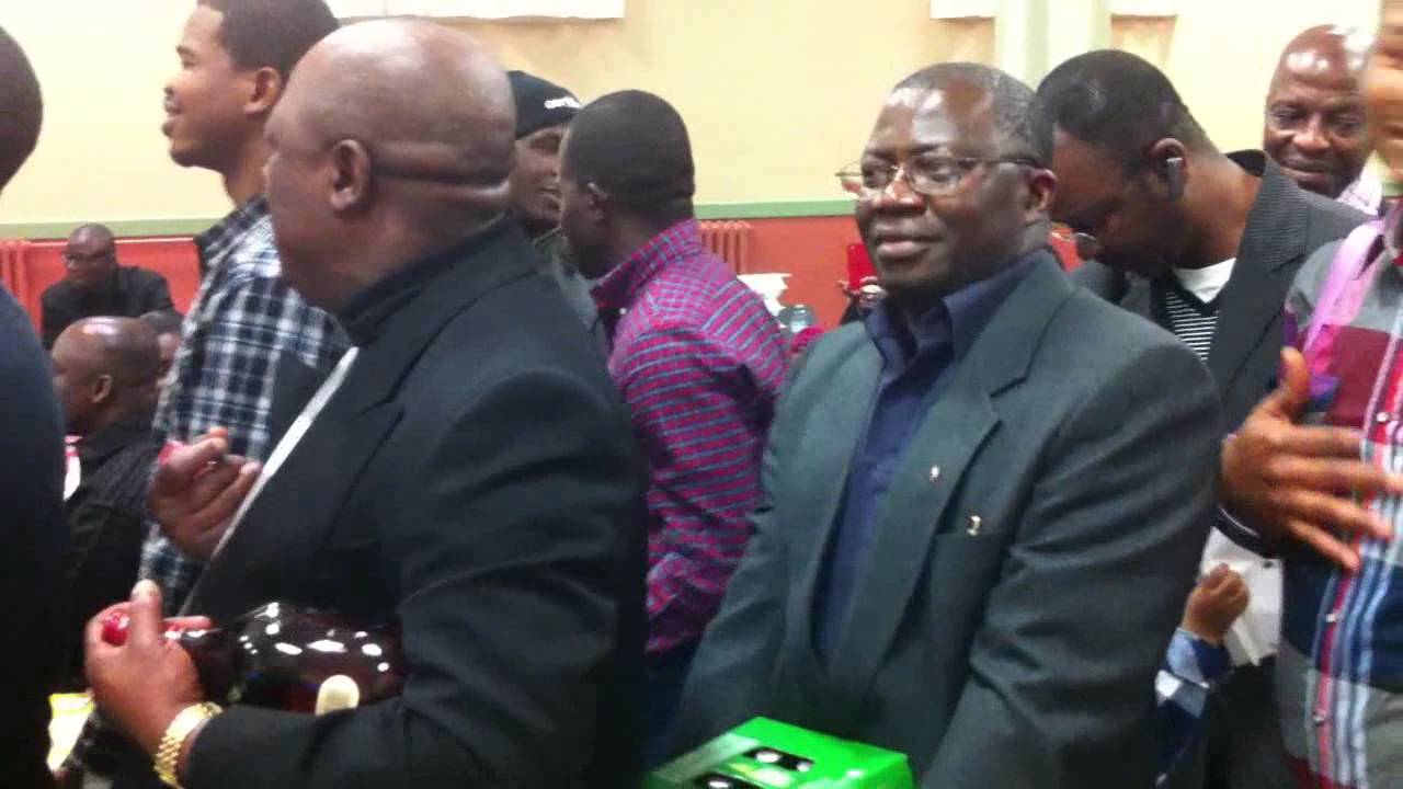 Francis Amara's mother in law's memorial Gift giving January 2015 - YouTube