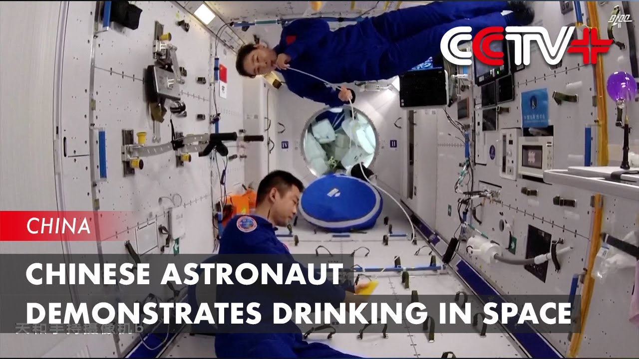 Astronauts Drinking In Space