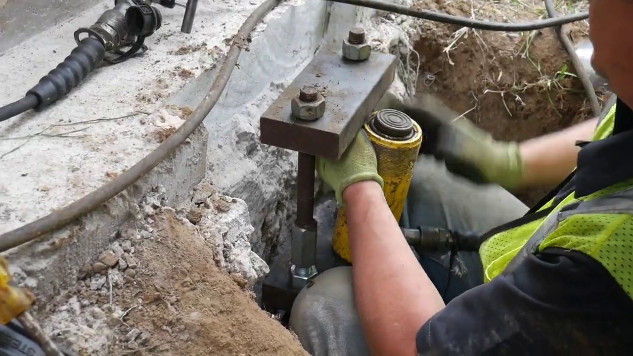 Driven Pier System Installation - YouTube