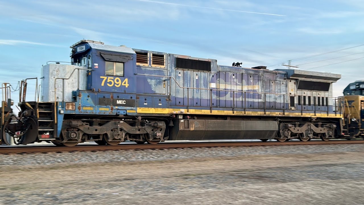 Chasing MEC C40-8 7594 on CSX M409 - YouTube