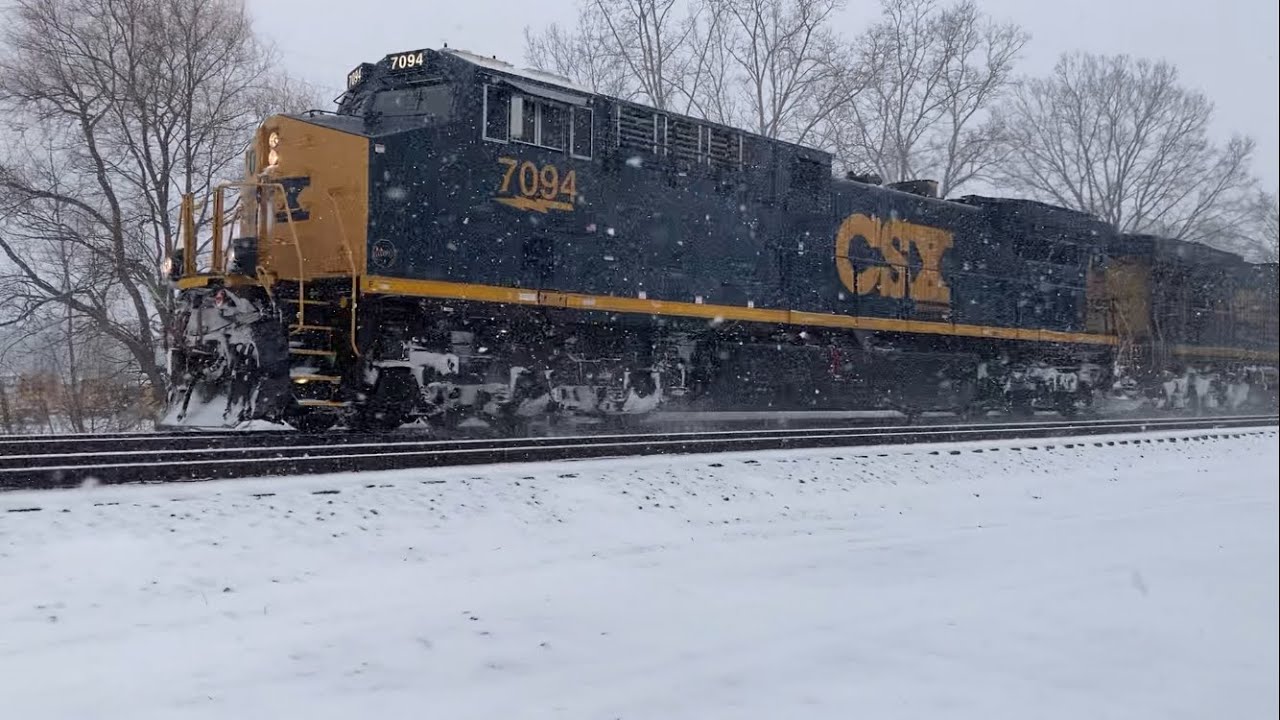 CSX 7094 dashing through the snow.. with 3 locomotives and 628 axles ...