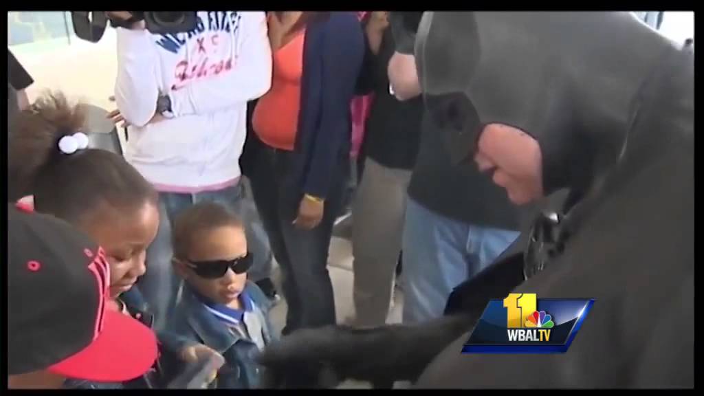 Saying goodbye to a real-life superhero - YouTube