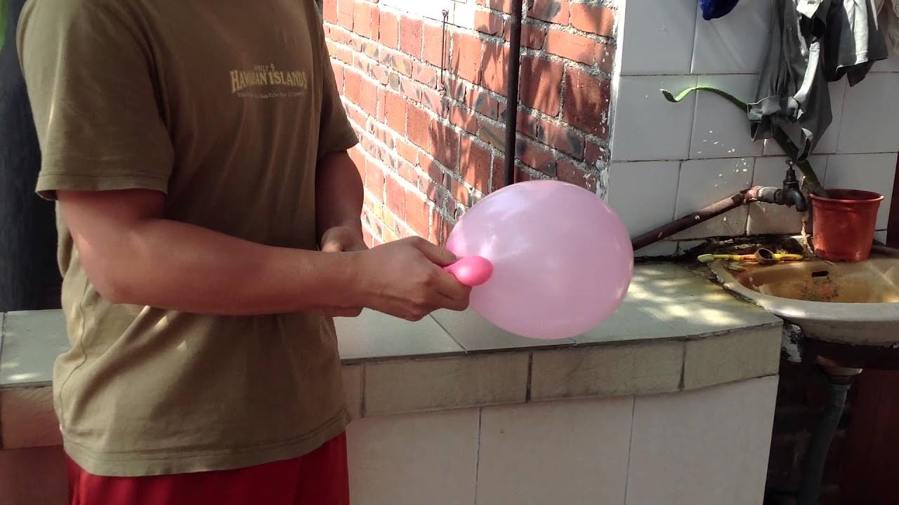 how to inflate mickey mouse balloons - YouTube
