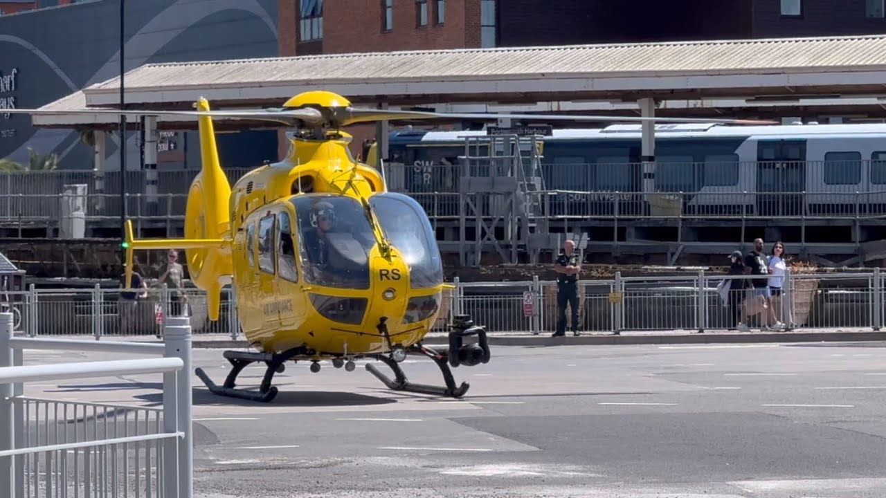 Air ambulance Helicopter taking off at The Hard Interchange bus station ...