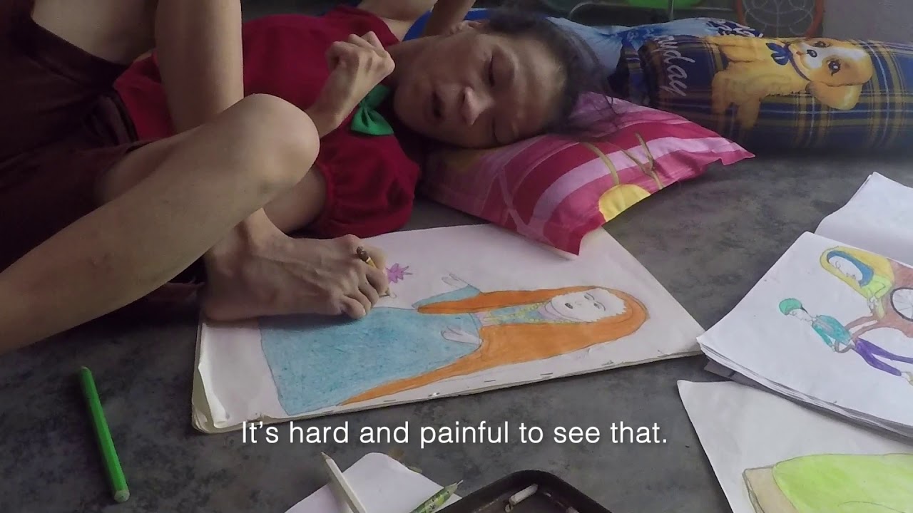 This 31-Year-Old Girl Is Disabled But She Uses Her Feet To Draw - YouTube