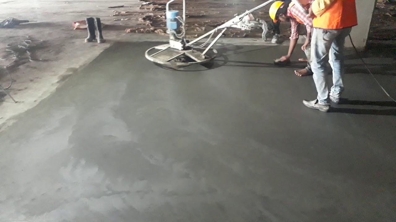 Floater final finishing on tremix concrete flooring - YouTube