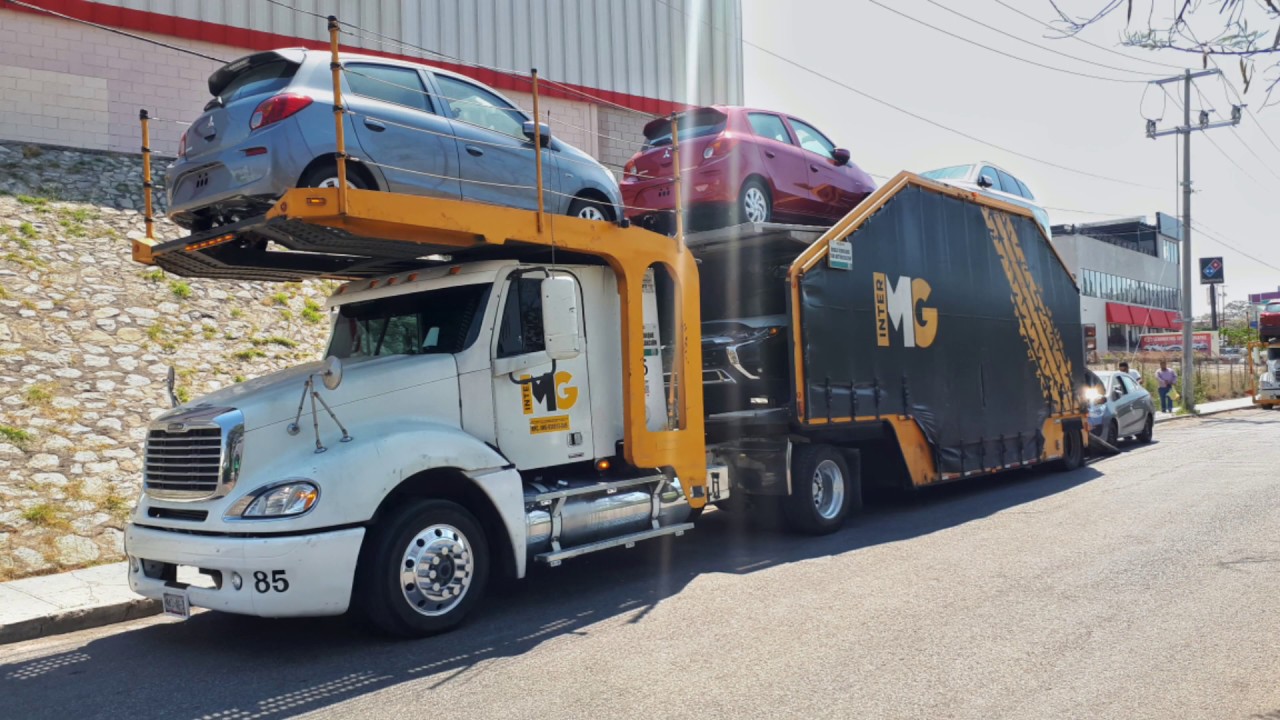 Madrinas de la linea Inter MG descargando mitsubishi outlander y ...