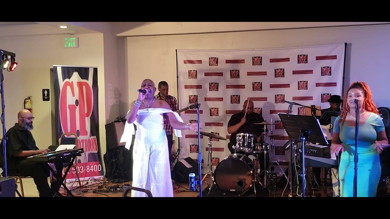 Songbird Coates sings "Sweet Thing," backed by The Unit Band at Wine ...