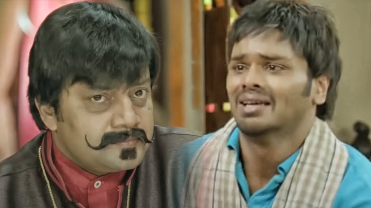 मनोज मांचू इस आदमी के पैर पकड़ कर गुज़ारिश कर रहा है। Simha 2 South ...