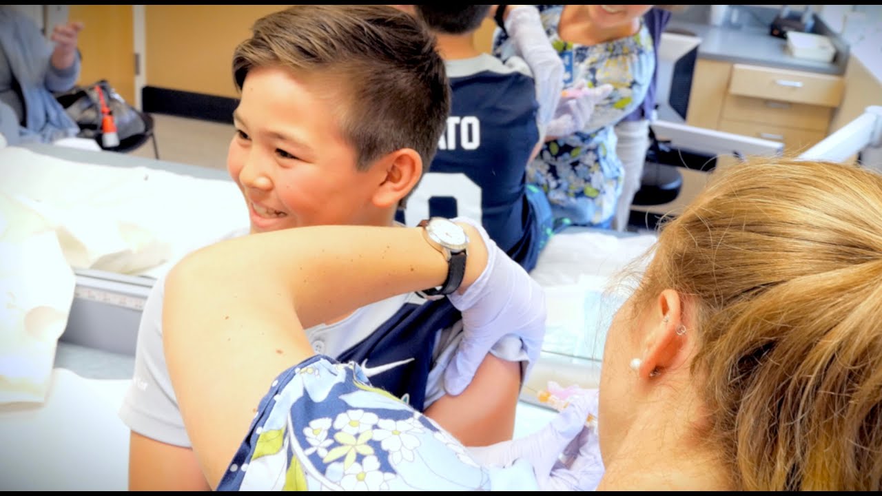Kid Smiles WHILE GETTING A SHOT | Dr. Paul - YouTube
