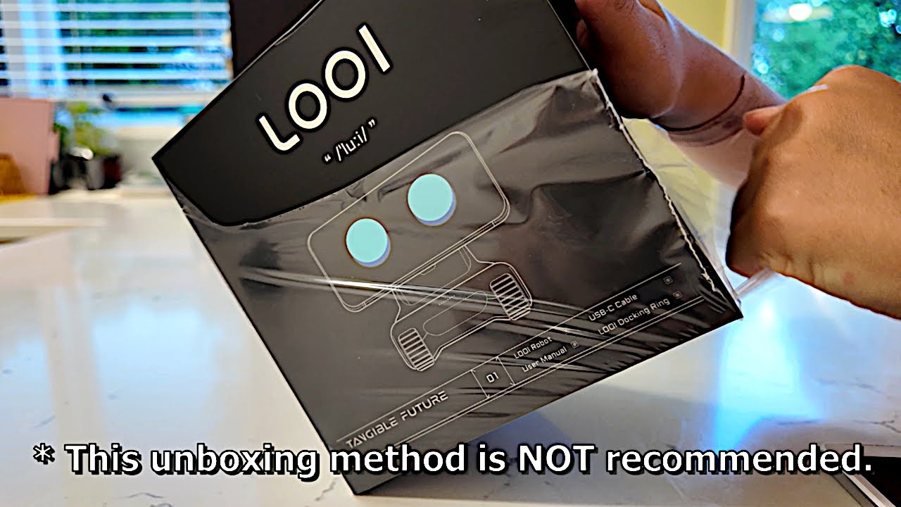 Unboxing LOOI: The BEST AI Desktop Robot Companion? First Look - YouTube