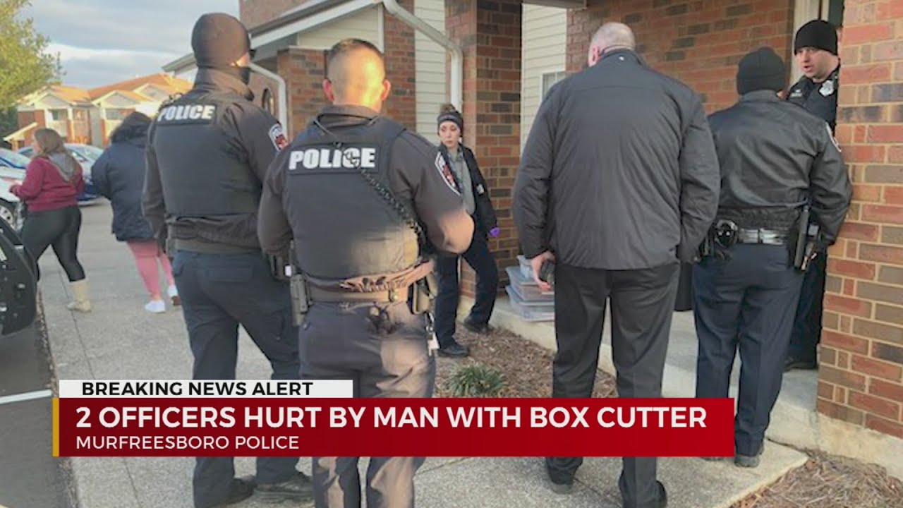 2 officers hurt by man with box cutter - YouTube
