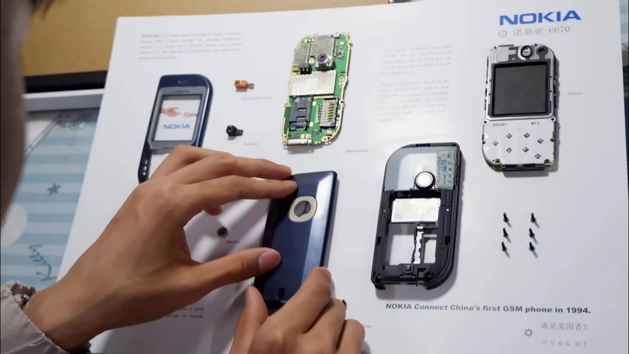 Nimble hands transform discarded phones into works of art - YouTube