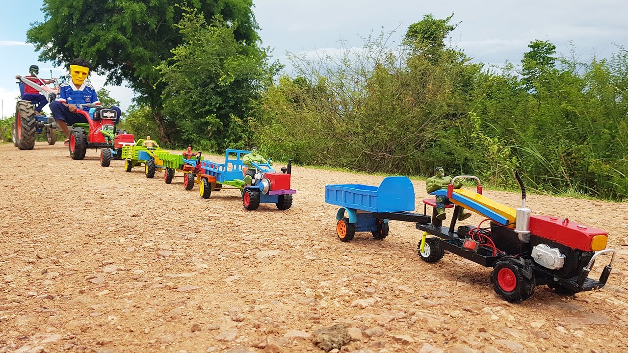 Mini Six Tractors on The Road - YouTube