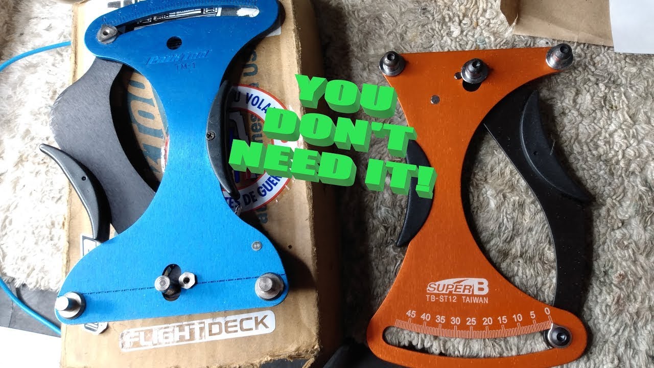 How to tension a bike wheel without a tension meter - YouTube