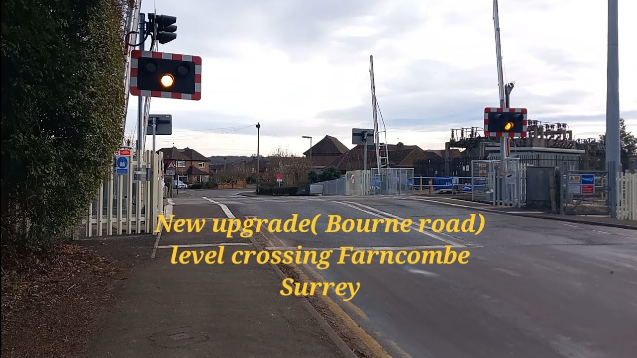 New upgrade(Bourne road) level crossing Farncombe Surrey. - YouTube