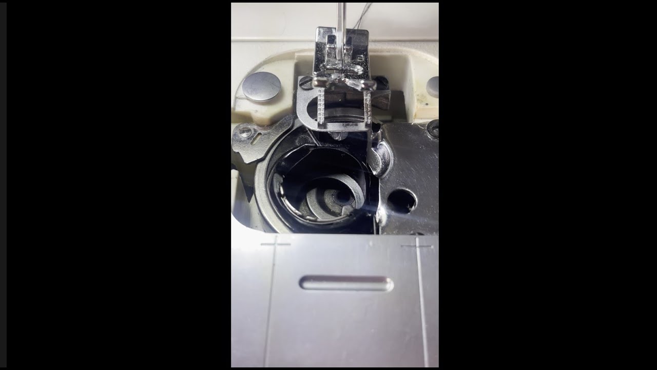 How to seat bobbin case for singer 9420 - YouTube