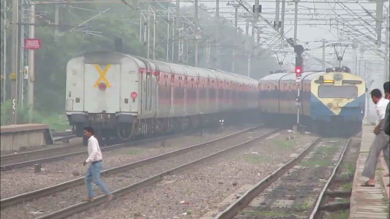 [IRFCA] 12434 Chennai Rajdhani overtaking Mahakoshal express - YouTube