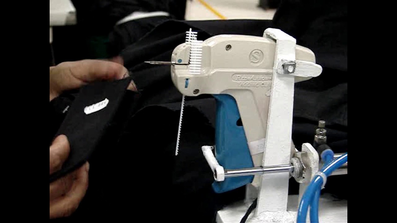 Tag gun automation garment production - YouTube