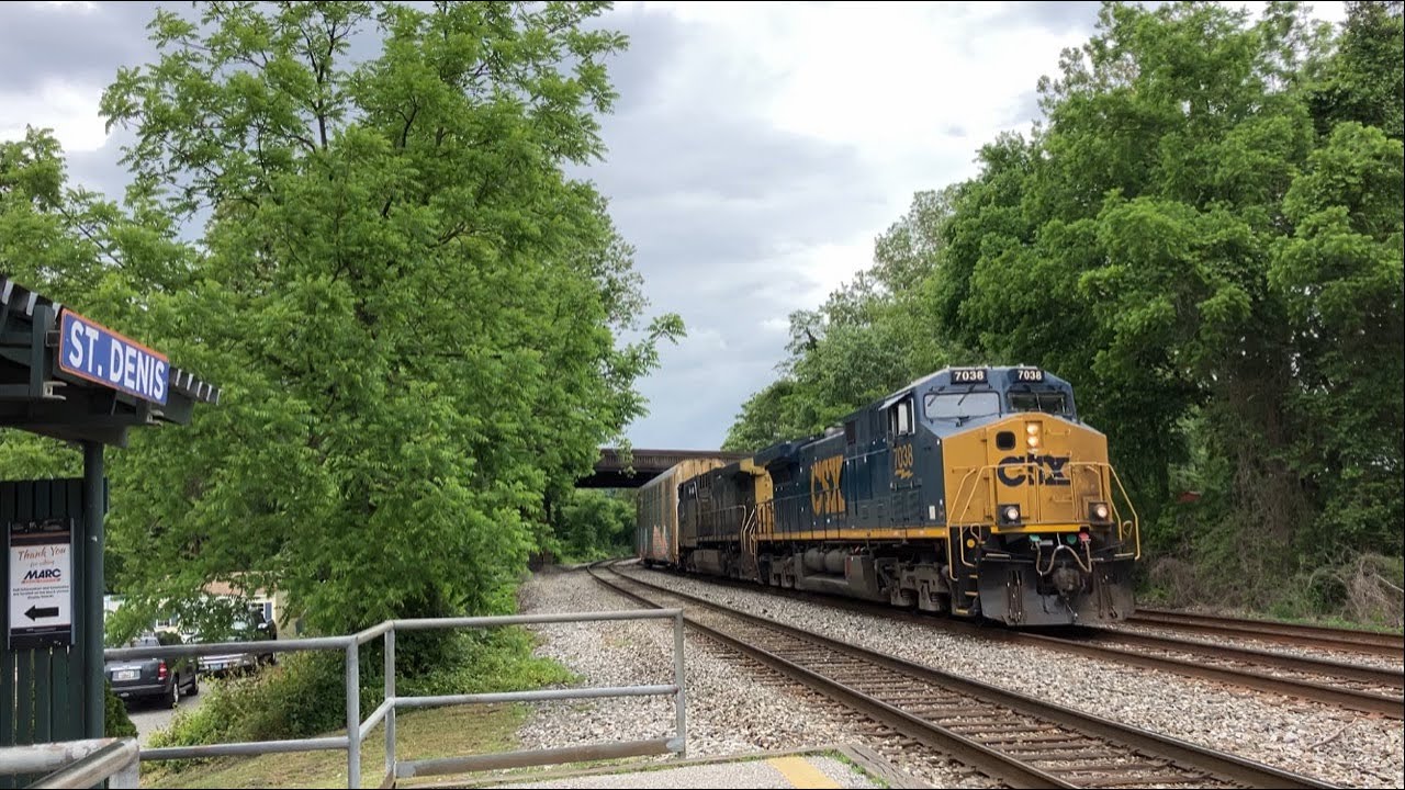 CSX L125 goes by St Denis with one autorack - YouTube