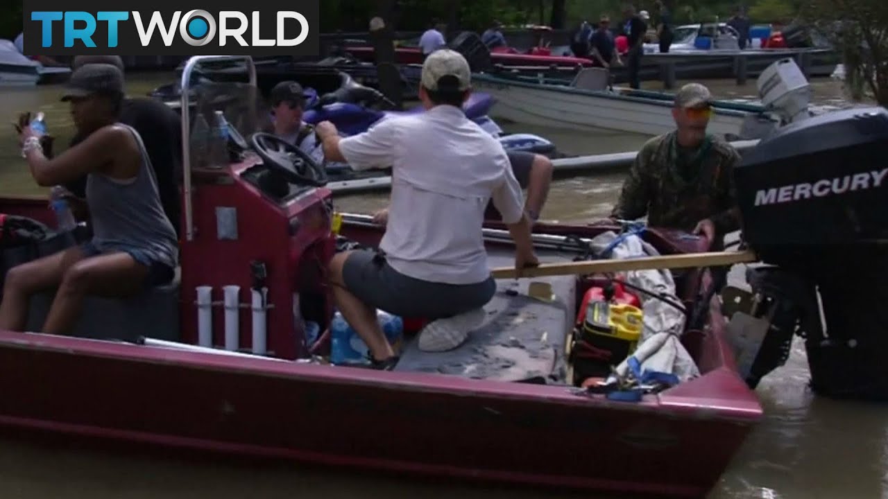 US Floods: Military personnel evacuate stranded residents - YouTube