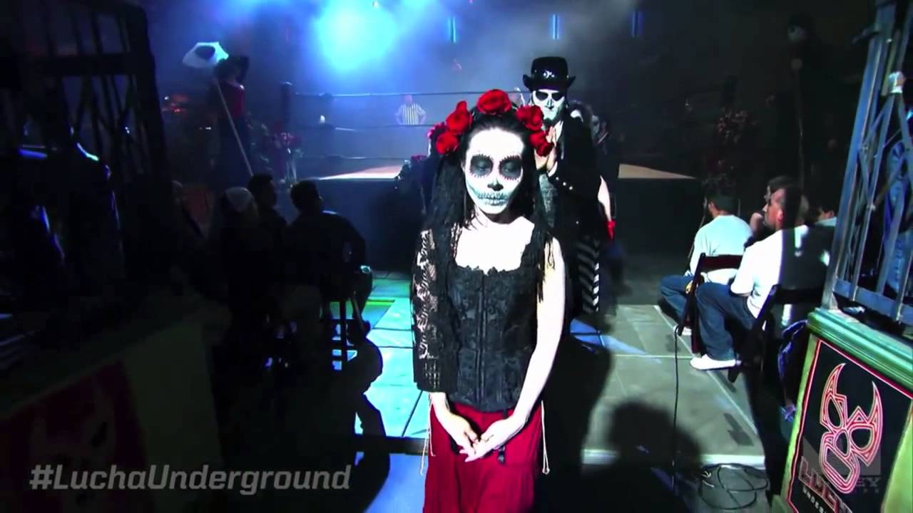Christopher Yates and Amy Marchese with Day of the Dead Stilt ...