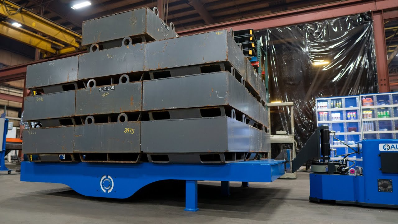 80,000 lbs. Battery Powered Tugger and Ox Cart | Hedin USA - YouTube