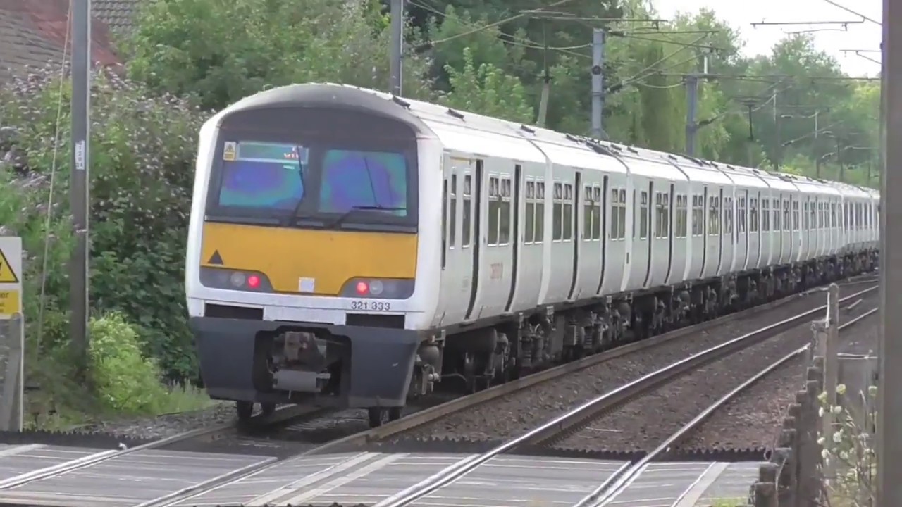 Debranded Renatus 321311 departs Stowmarket with 321354 and 321333 on ...