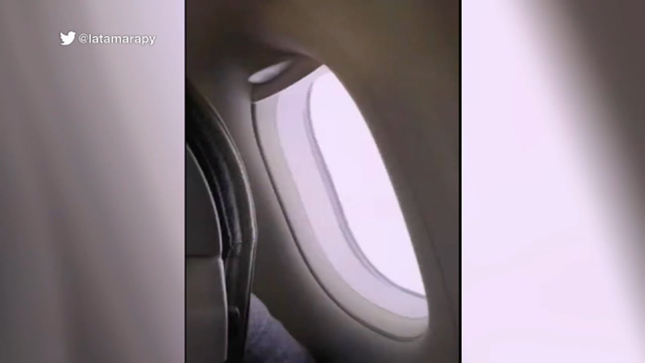 Video show terrifying moment plane nose cracks during storm - YouTube