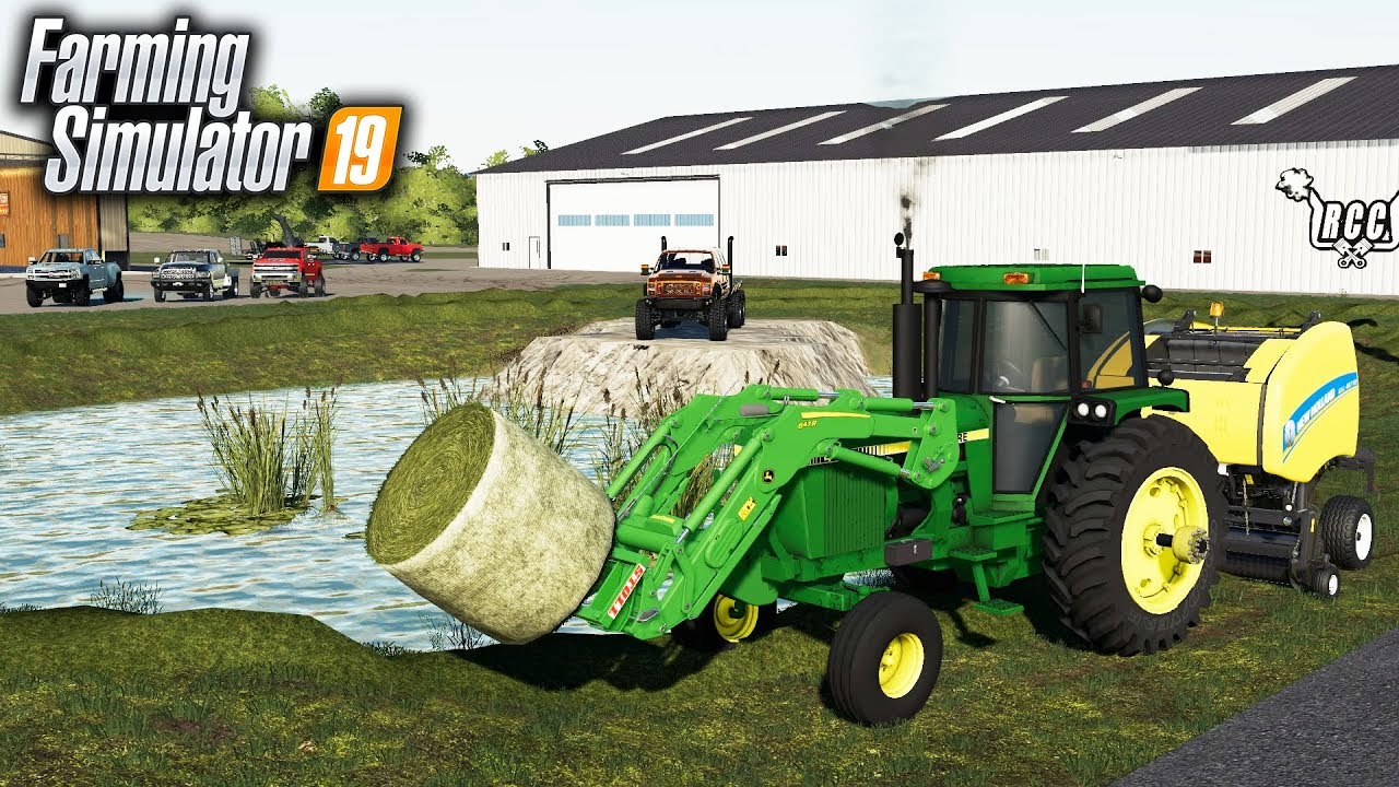 FS19- BALING & RAKING THE FRONT LAWN OF MY TRUCK DEALERSHIP | RCC - YouTube