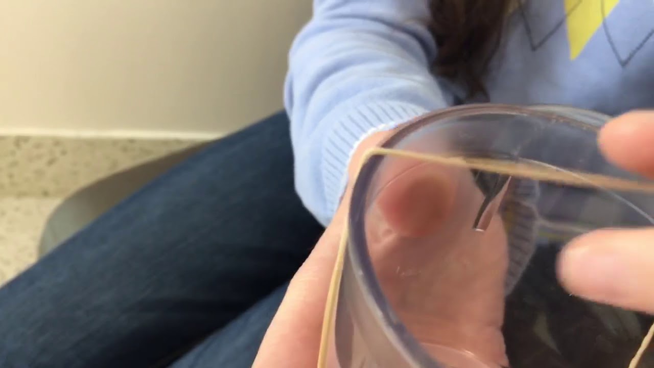 Plucking a Rubber Band - YouTube