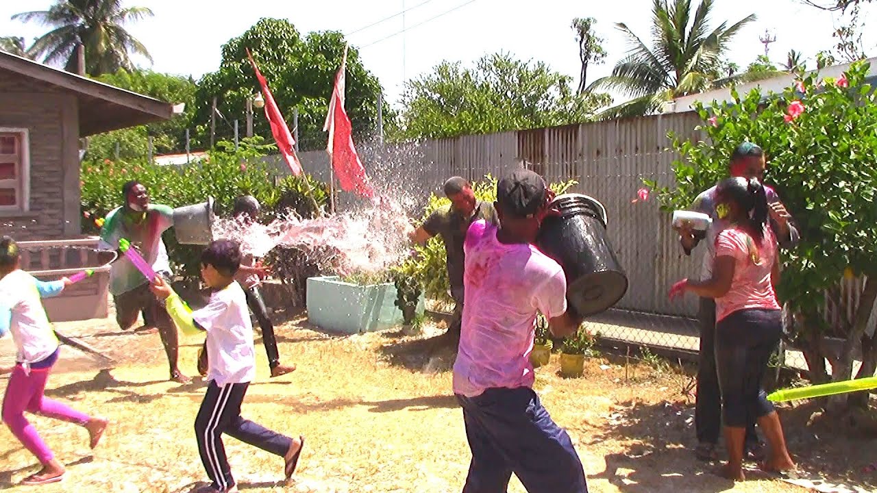 Playing Phagwah / Holi House to House at New Road on the West Coast ...