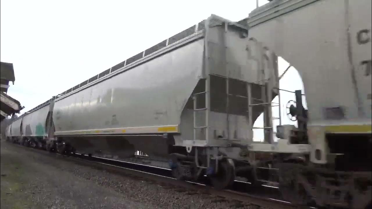 (Northbound) BNSF Loaded Grain Train passes through the Steilacoom Ferry Terminal. - YouTube