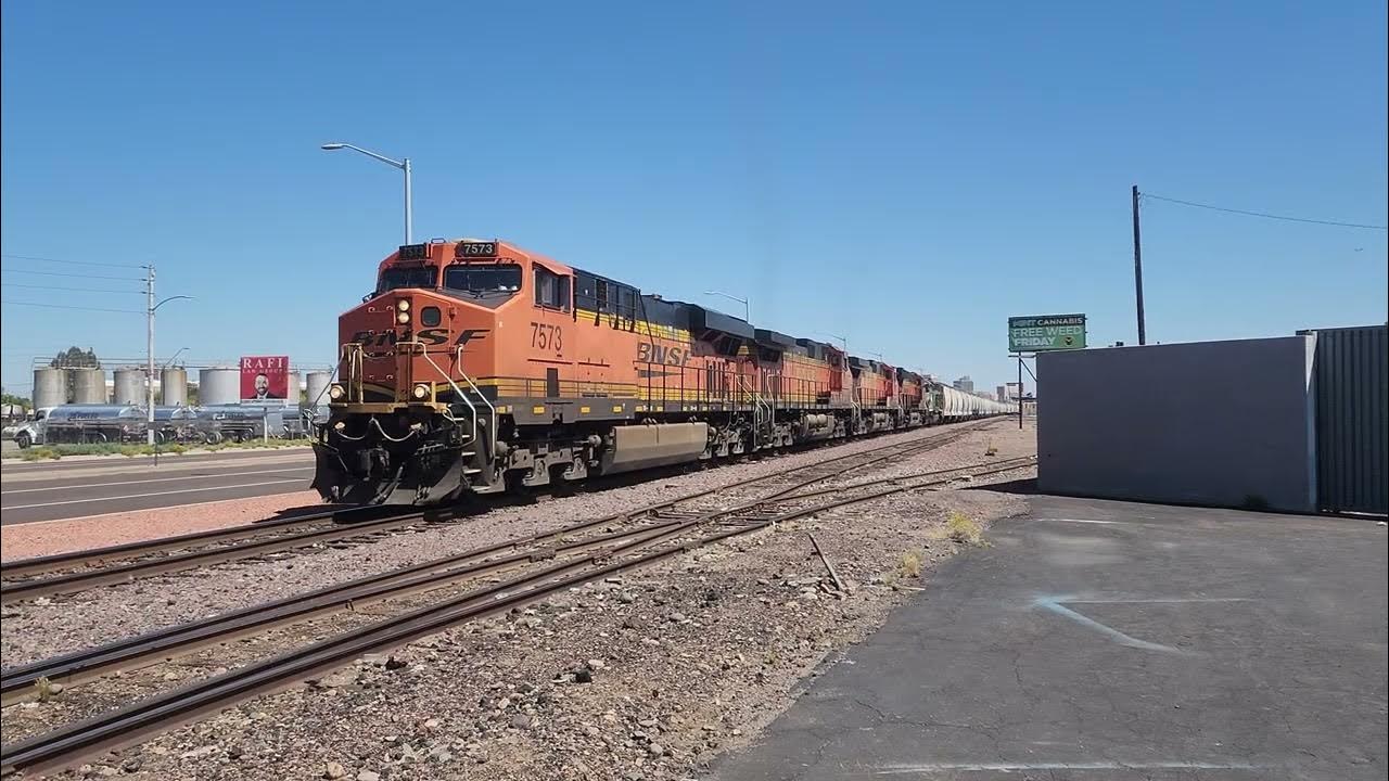 BNSF 7573 leaving Mobest Yard with BNSF 1915 SD40-2 - YouTube
